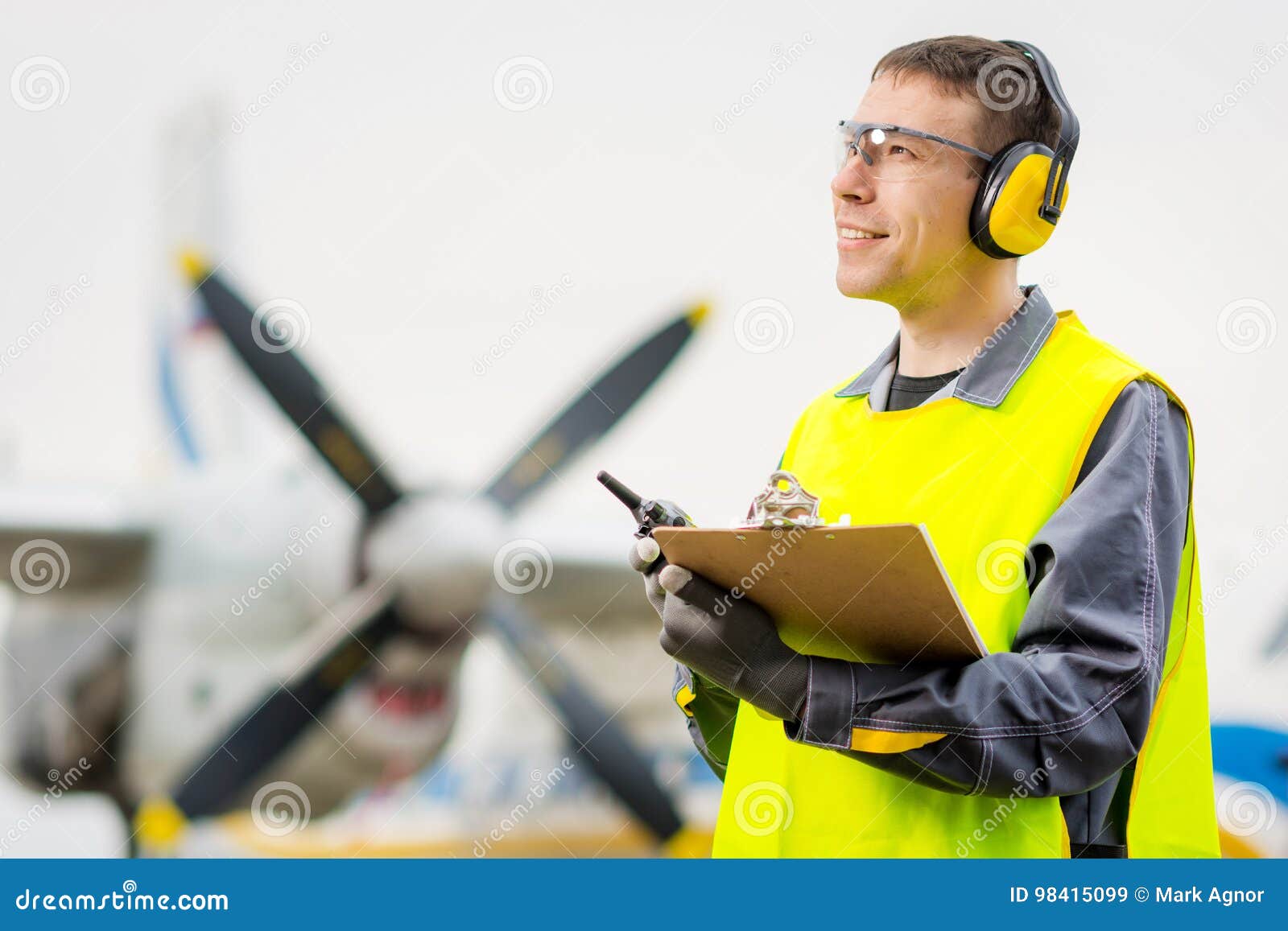 Male airport worker stock image. Image of airport, propeller - 98415099