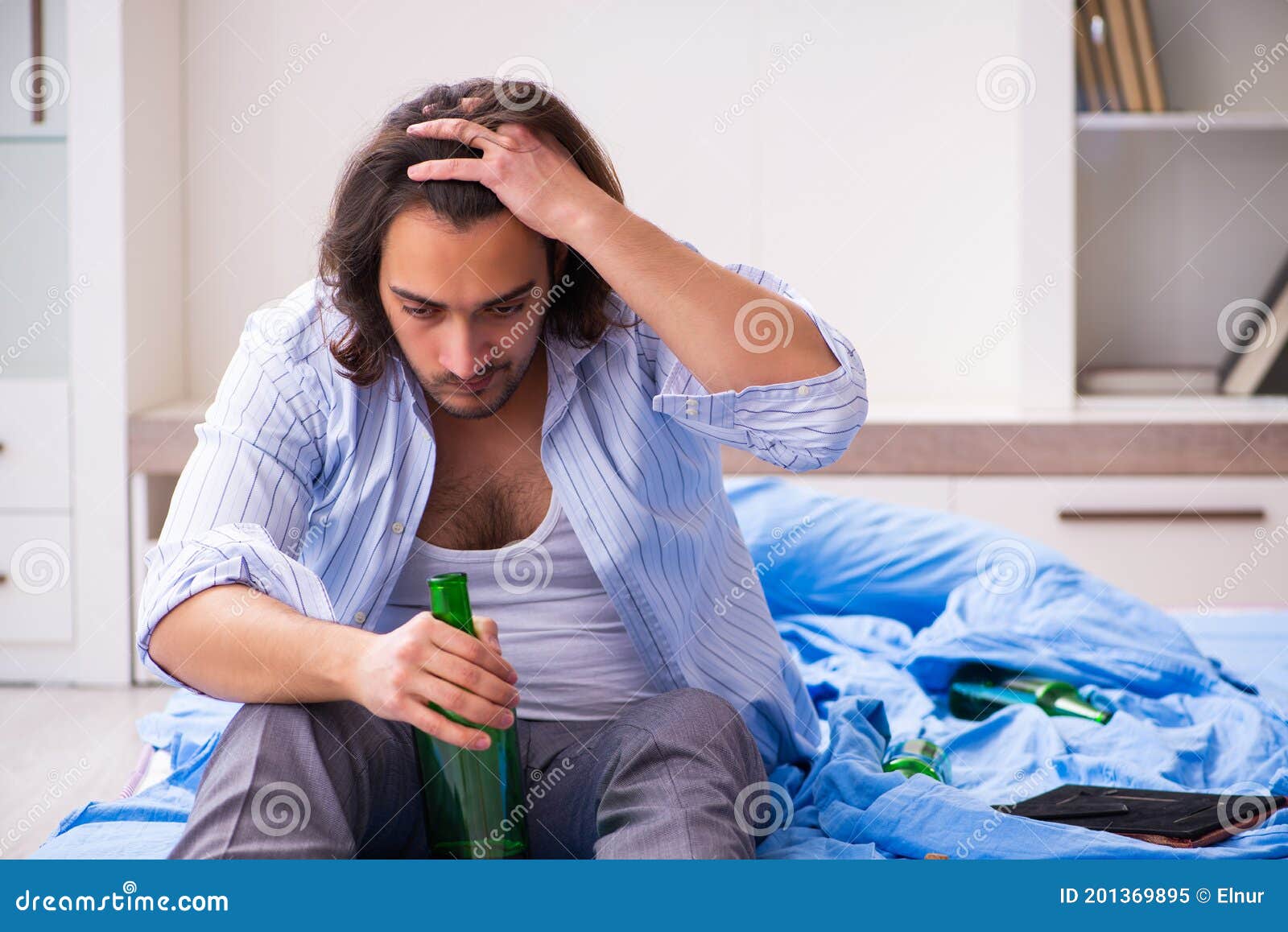 Young Male Alcoholic in the Bedroom Stock Image - Image of alcoholic ...
