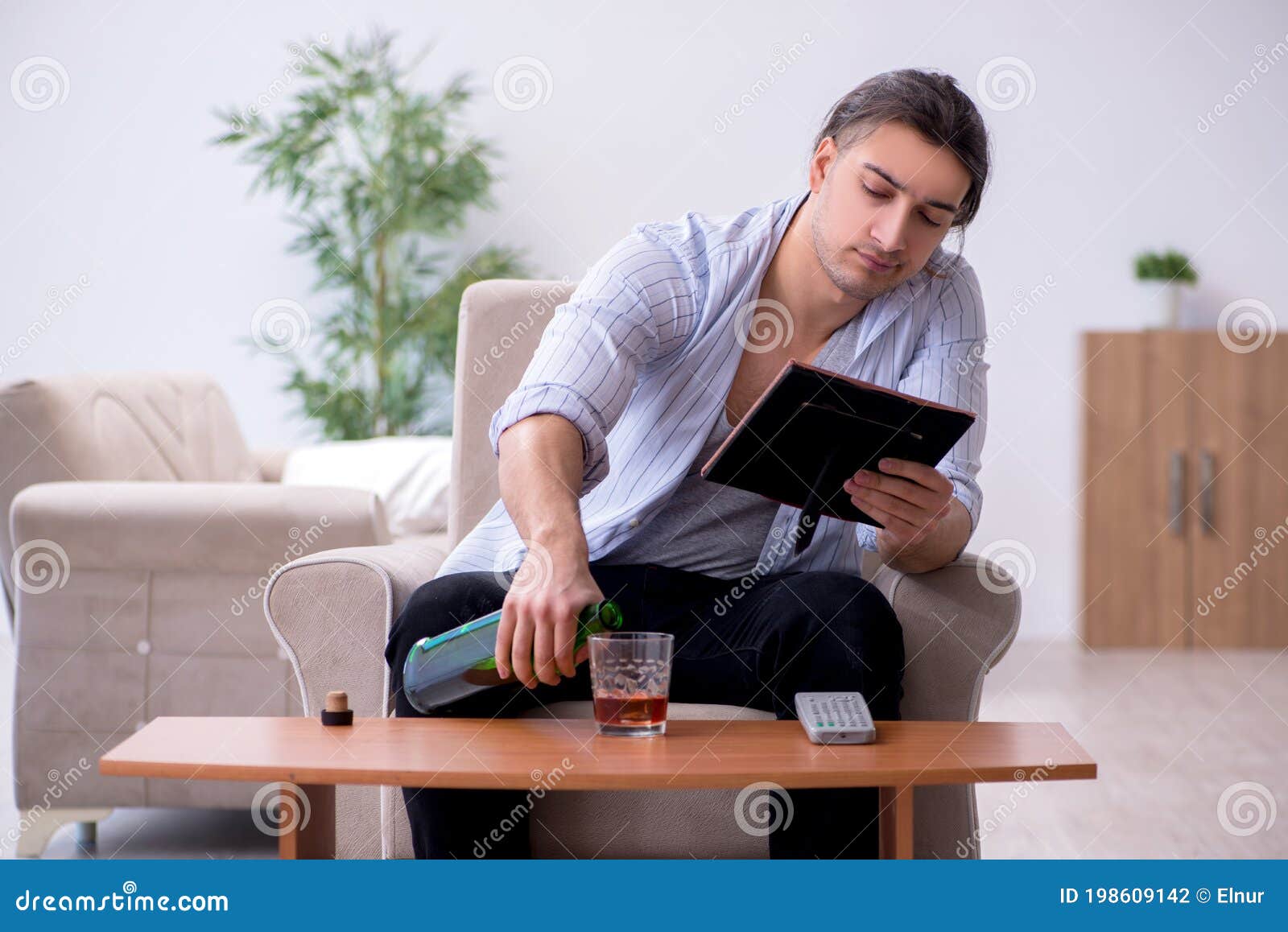 Young Male Alcoholic in Unrequited Love Concept Stock Photo - Image of ...