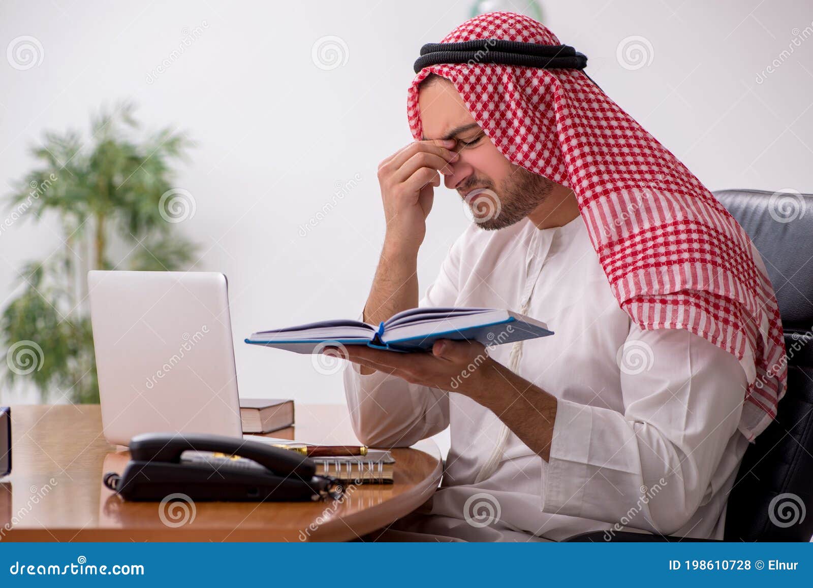 Young Male Arab Employee Working in the Office Stock Photo - Image of ...