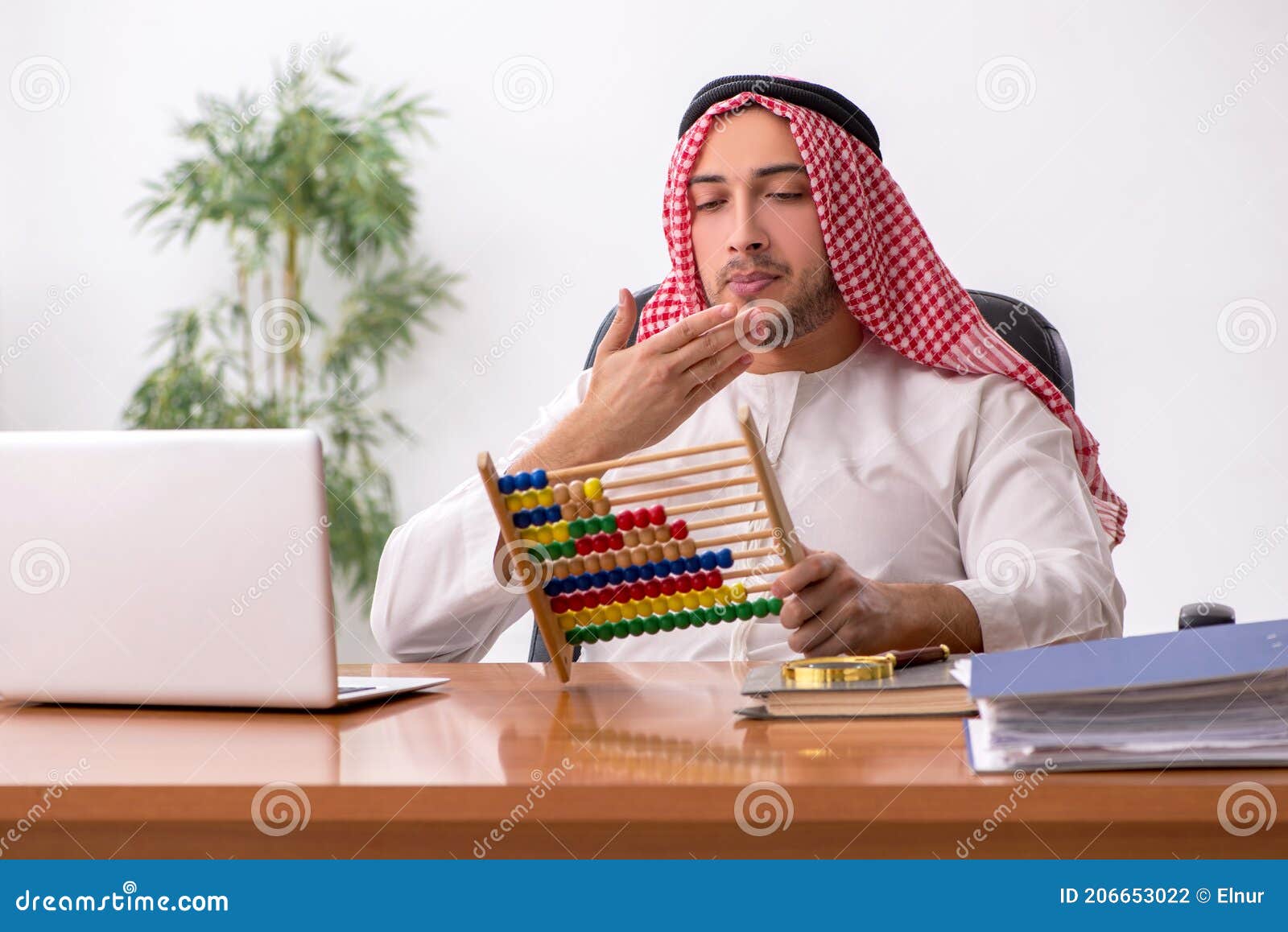 Young Male Arab Employee Working in the Office Stock Photo - Image of ...