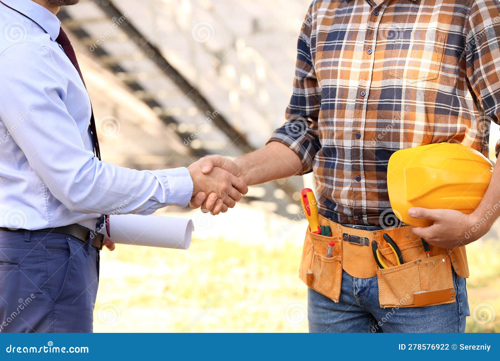 Male Architect and Builder Shaking Hands Outdoors Stock Photo - Image ...
