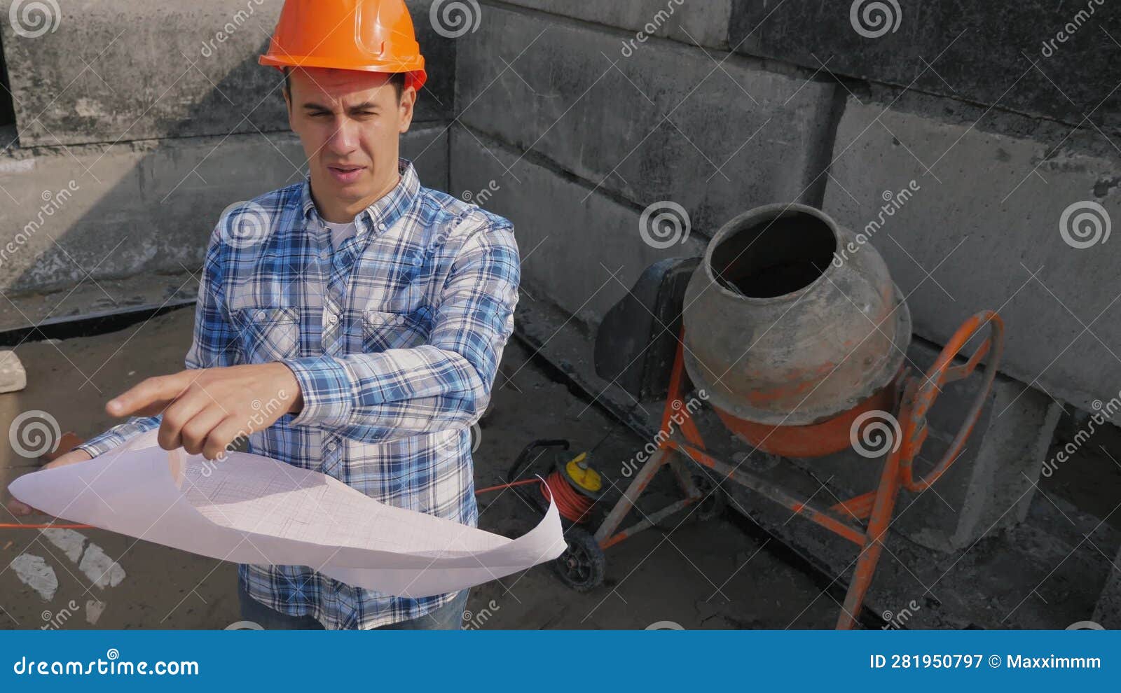 Male Architect Builds a Foundation of Cement. Concept Building ...