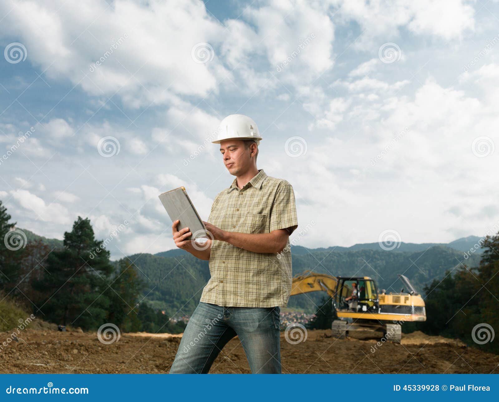 Male Architect Checking Construction in Progress Stock Photo - Image of ...