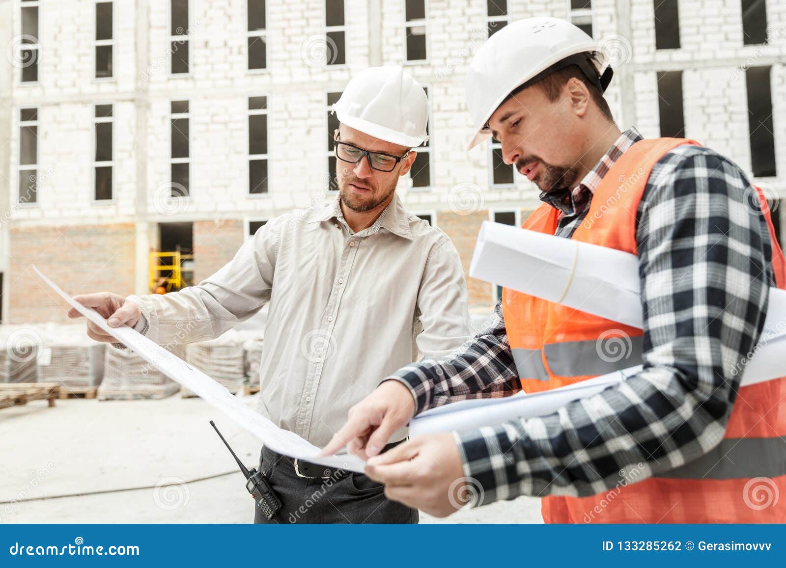 Male Architect and Developer with Blueprints Discussing Archite Stock ...