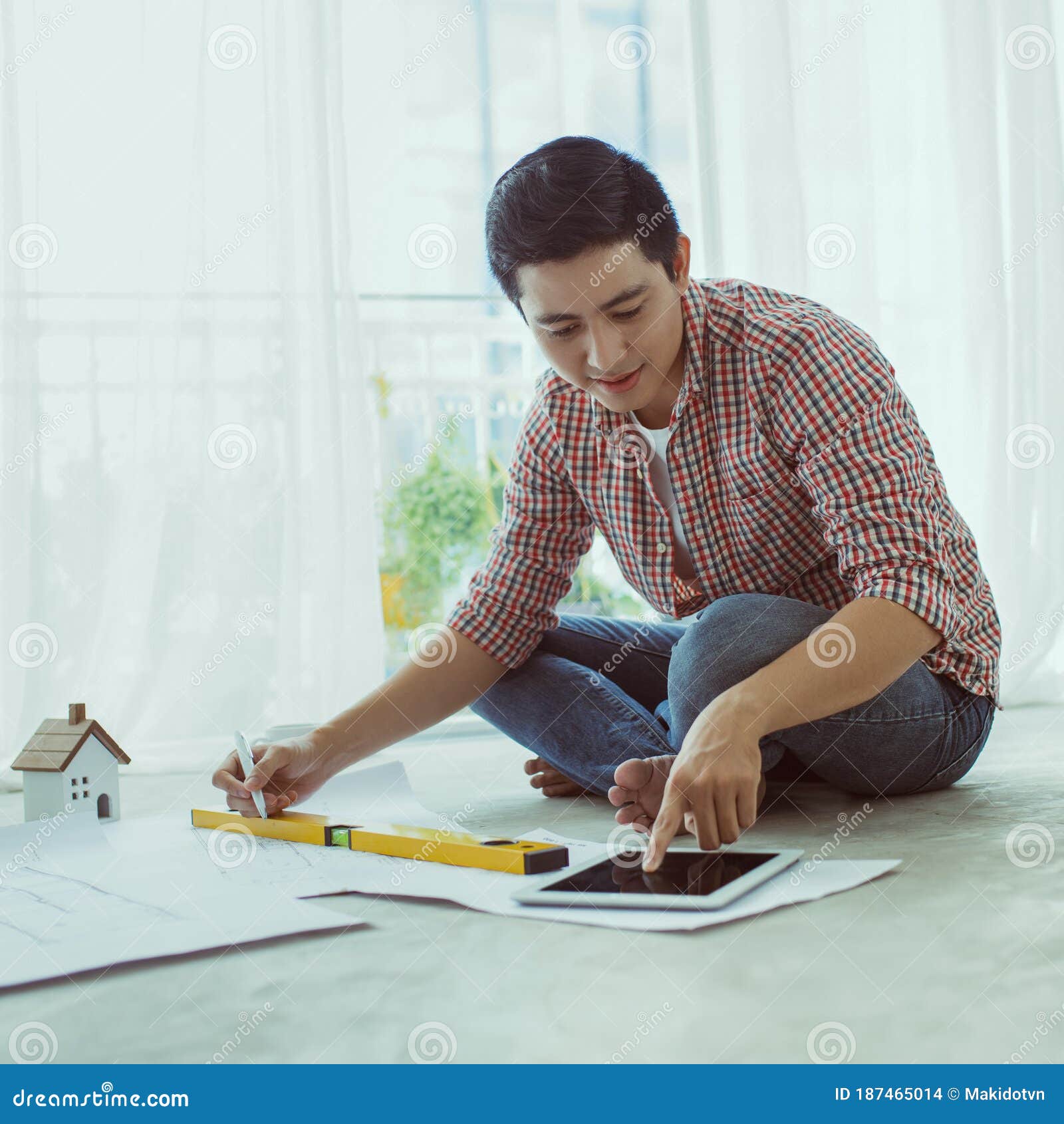 Male Architect or Engineer Working at Home Drawing the Construction ...