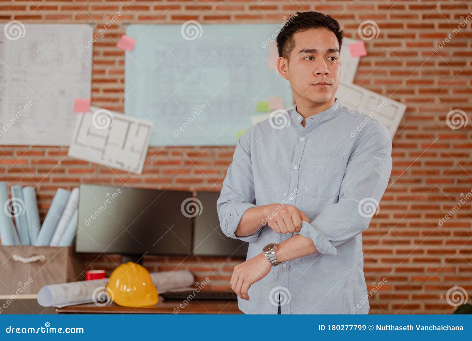 Male Architect in Formalwear Bending Working Engineering with ...