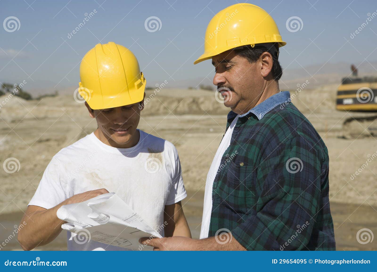 Male Architects Discussing at Construction Site Stock Image - Image of ...