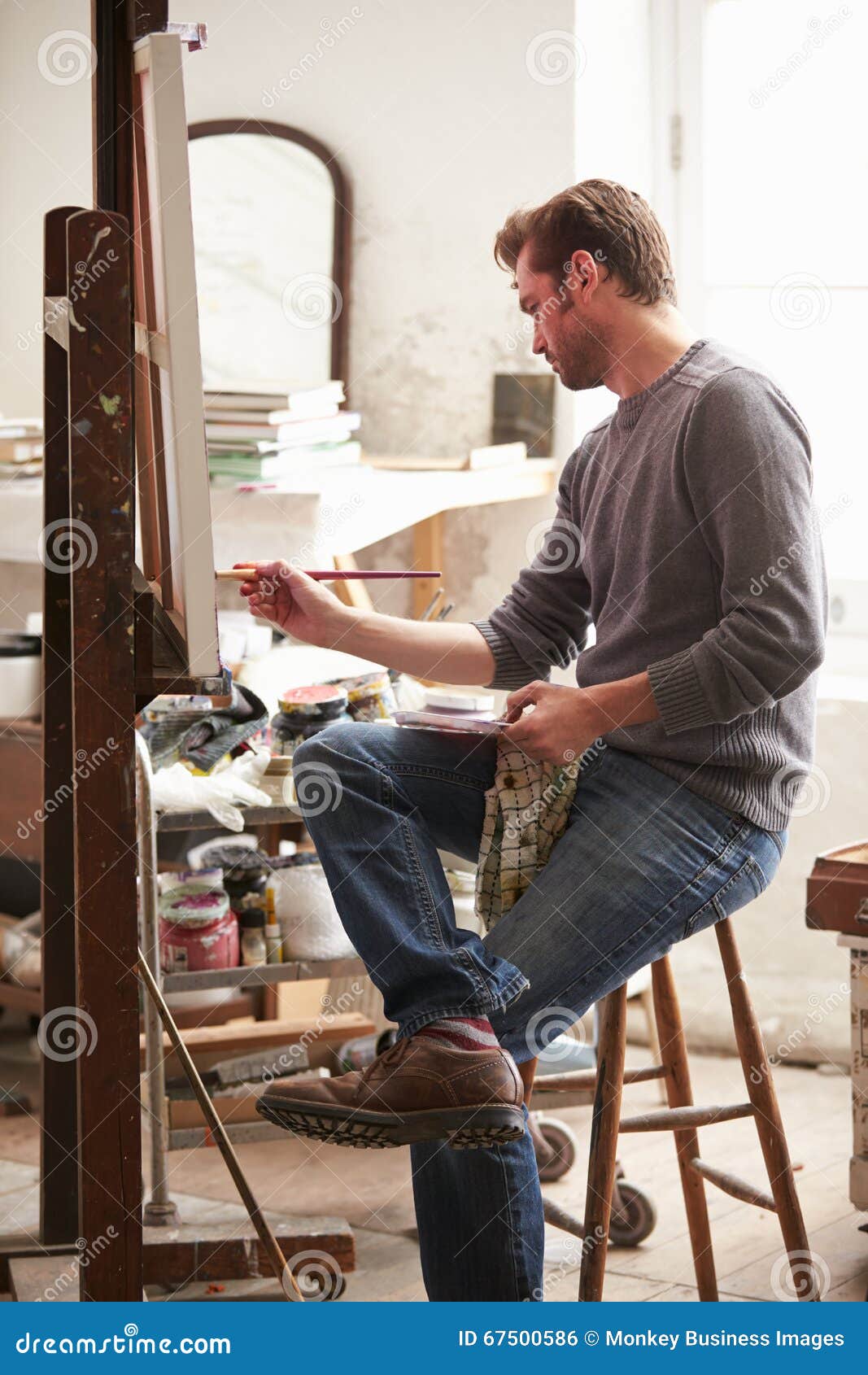 Male Artist Working on Painting in Studio Stock Photo - Image of ...