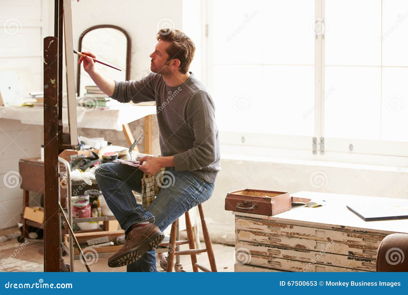 Male Artist Working on Painting in Studio Stock Image - Image of ...
