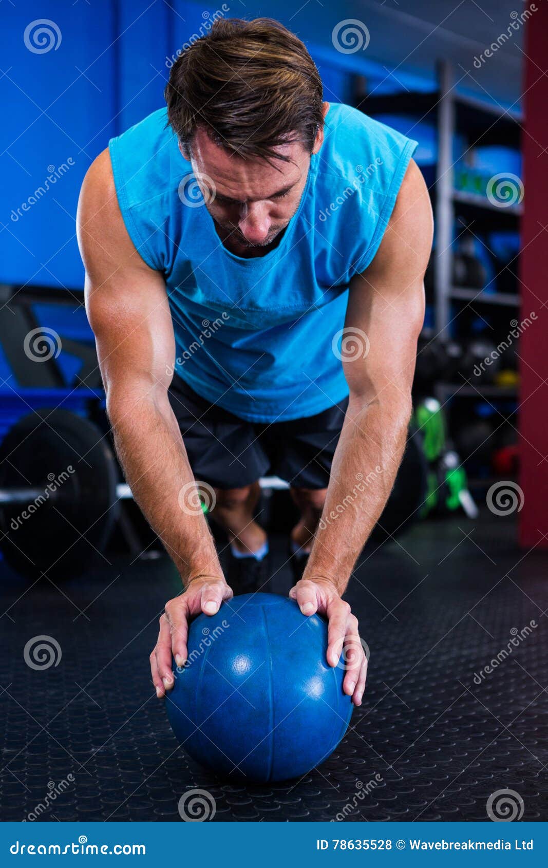 Male Athlete with Ball in Gym Stock Photo - Image of male, equipment ...
