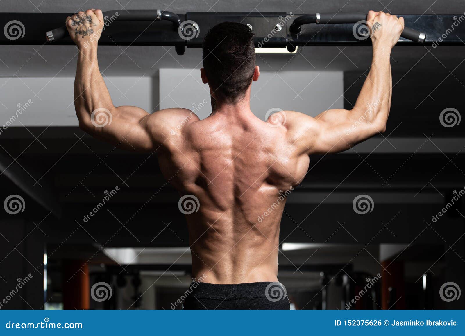 Male Athlete Doing Pull Ups Stock Photo - Image of bodybuilding ...
