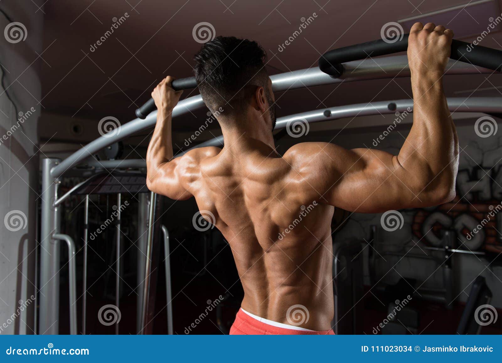 Male Athlete Doing Pull Ups Stock Photo - Image of clothing, caucasian ...