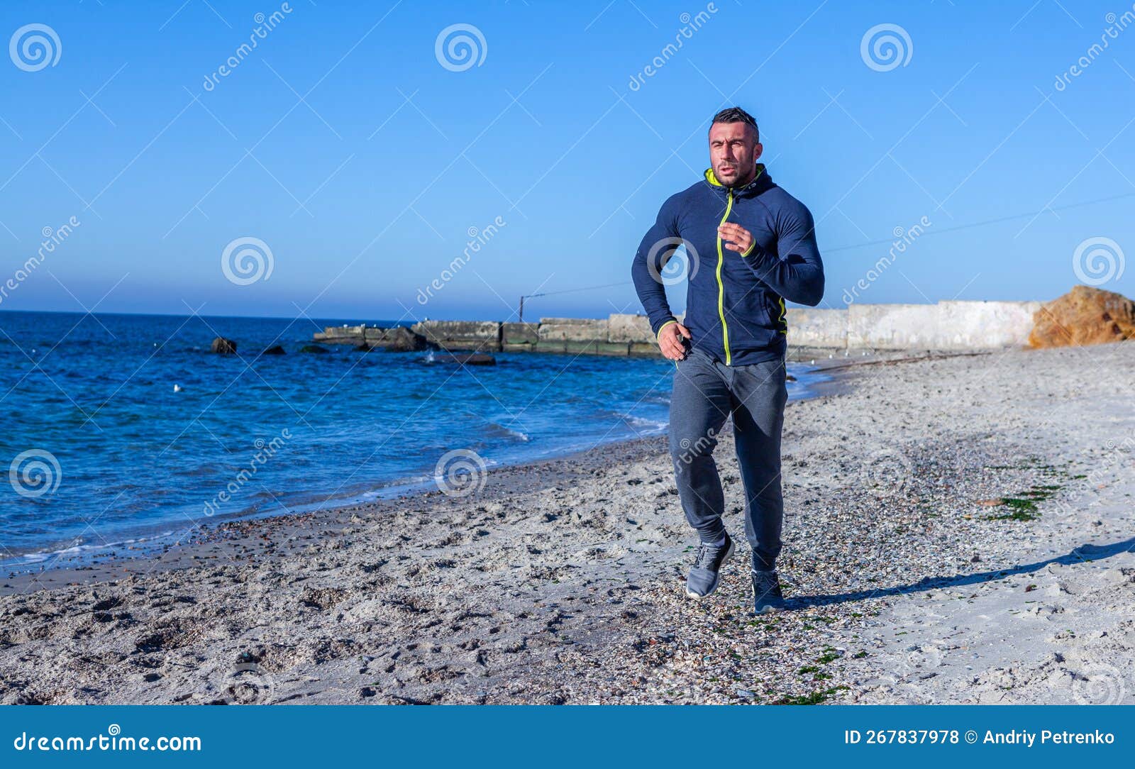 Male Athlete Doing Sports on the Beach Stock Photo - Image of ...