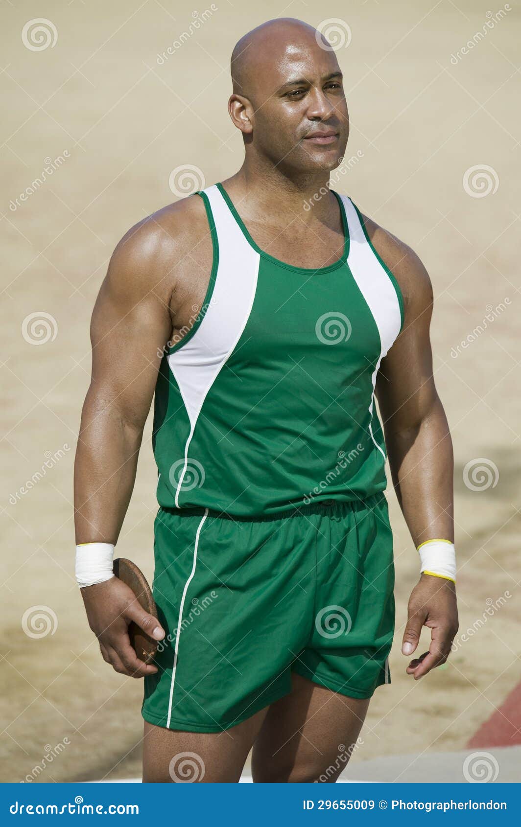 Male Athlete Holding Discus Stock Image - Image of person, people: 29655009