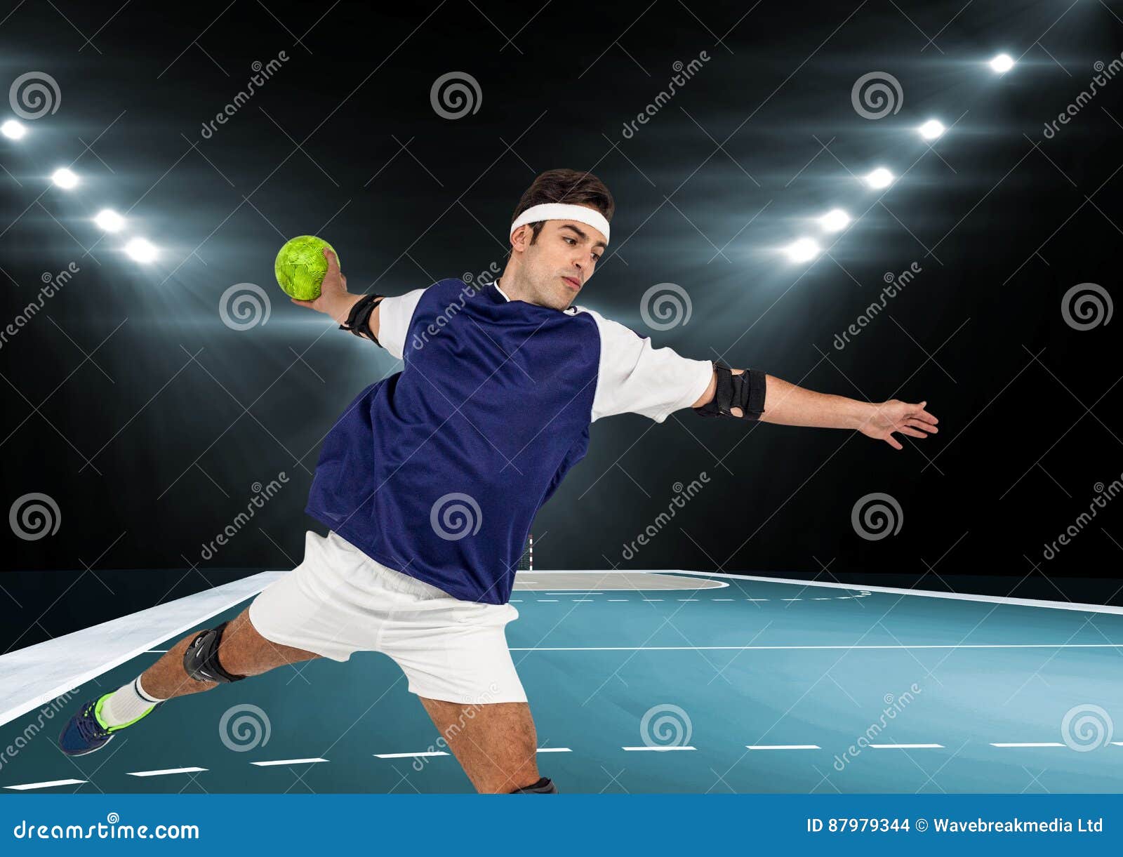 Male Athlete Playing Handball in Stadium Stock Photo - Image of ...