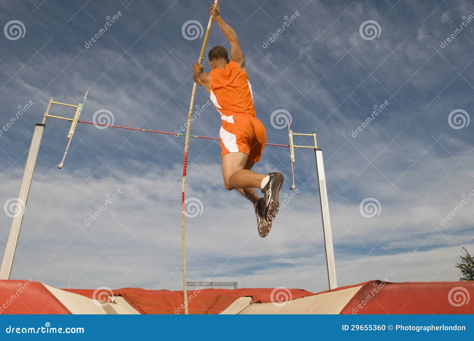 Male Athlete Pole Vaulting stock photo. Image of horizontal - 29655360