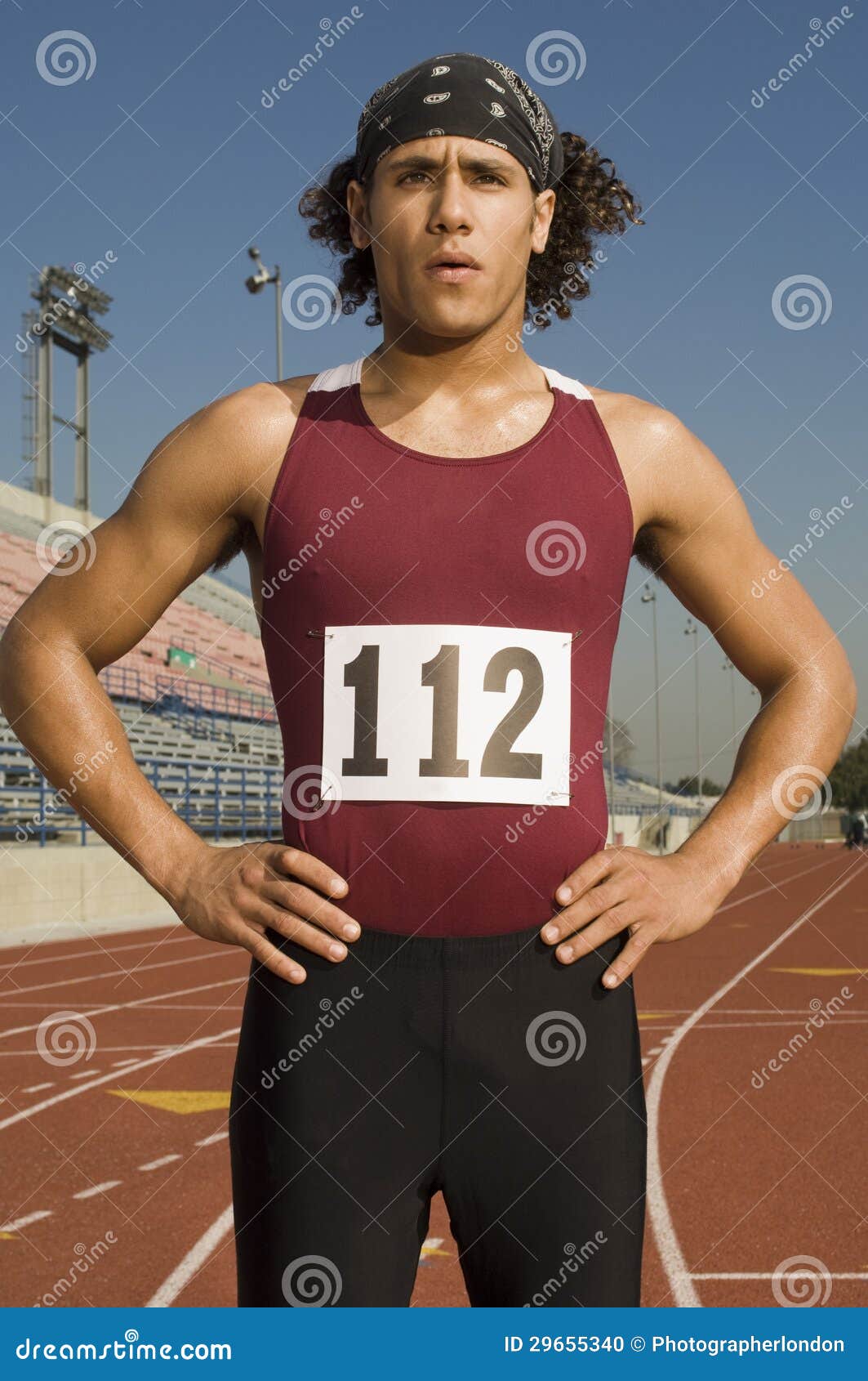 Male Athlete Standing on Racetrack Stock Photo - Image of athletic ...