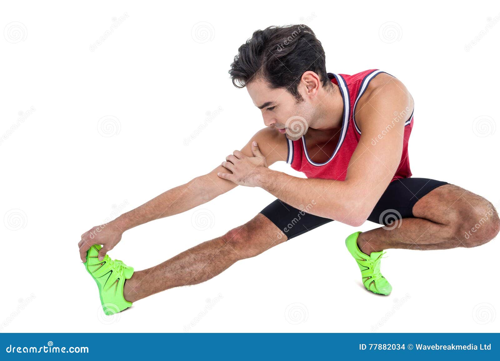 Male Athlete Stretching His Hamstring Stock Photo - Image of background ...