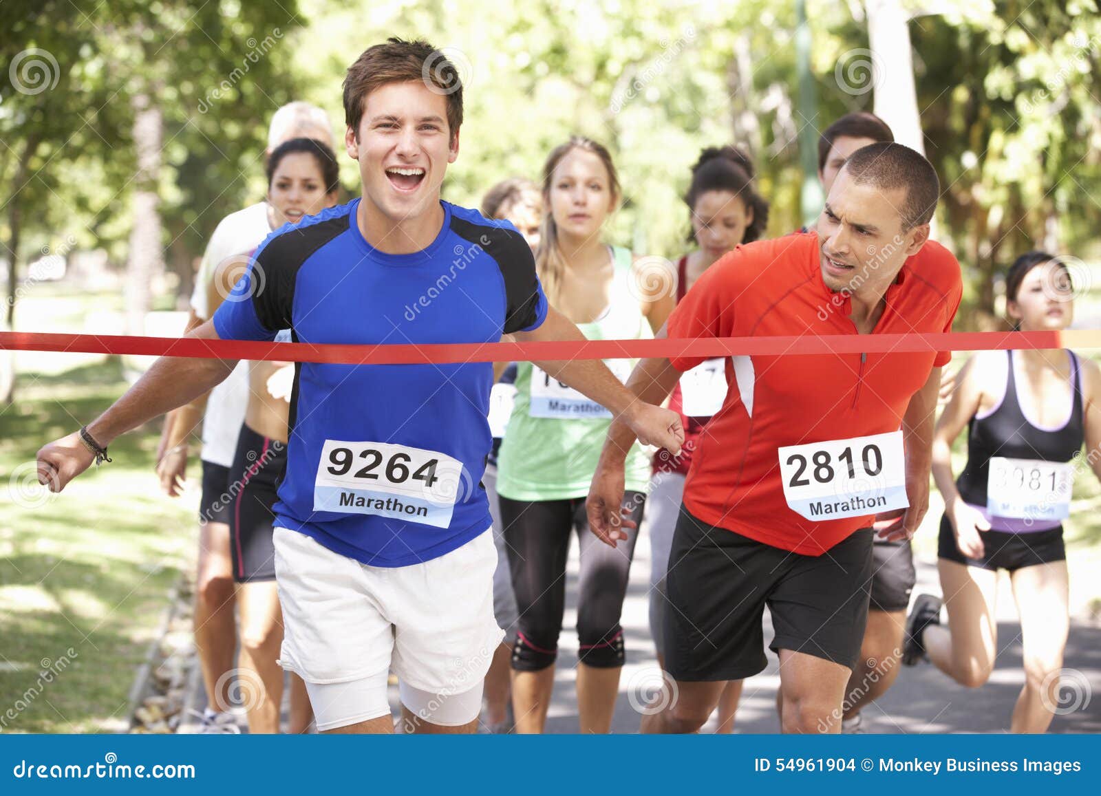 Male Athlete Winning Marathon Race Stock Photo - Image of group, race ...