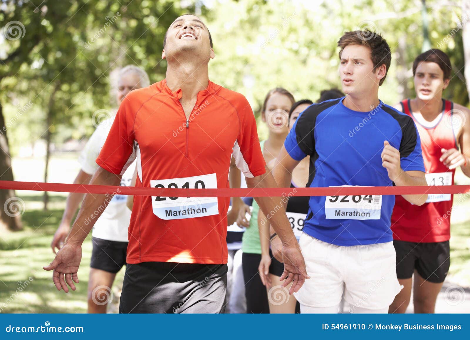 Male Athlete Winning Marathon Race Stock Photo - Image of marathon ...