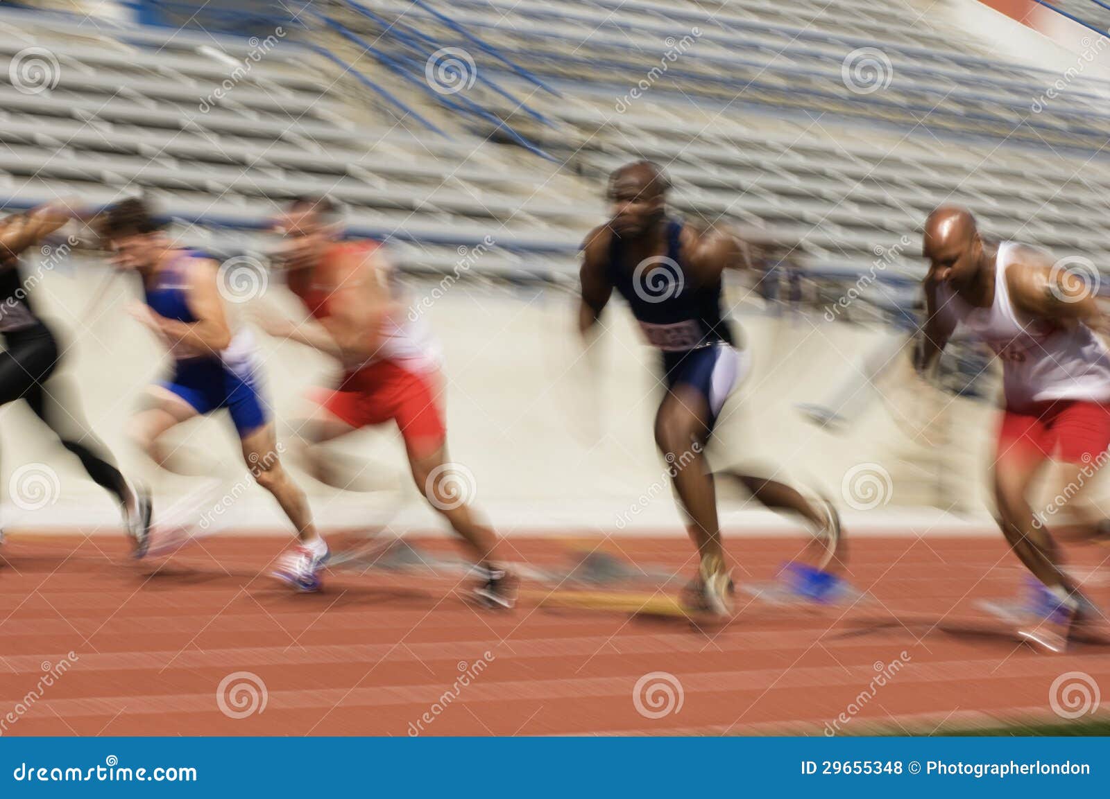 Male Athletes Racing in Stadium Stock Photo - Image of aged, mature ...
