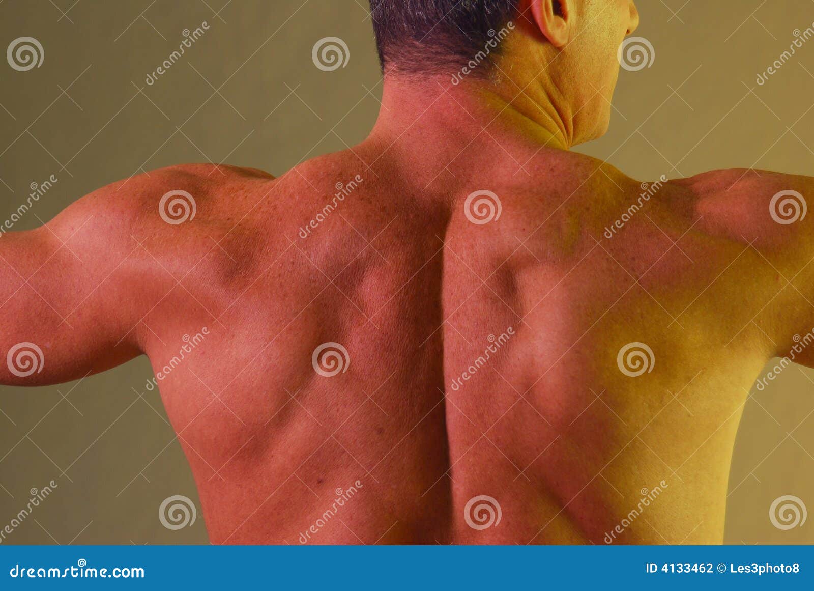 Male back muscles yellow stock photo. Image of potency - 4133462