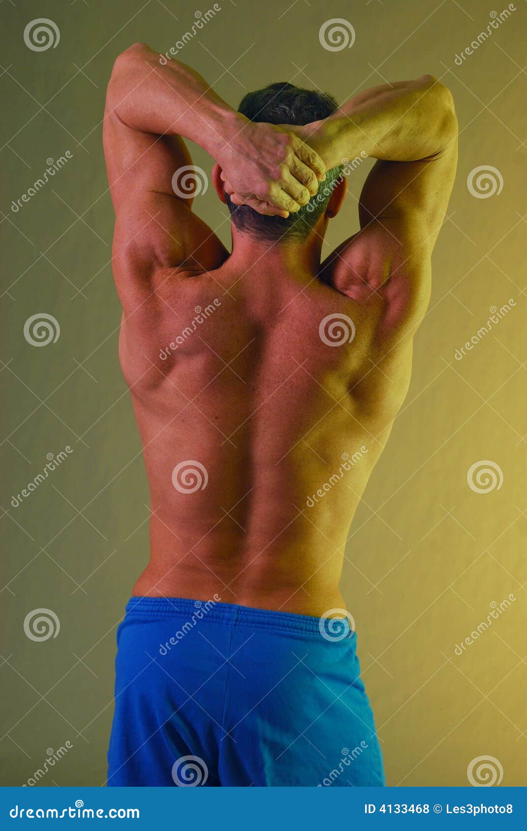 Male Back Muscles Yellow Stretching Stock Photo - Image of mankind ...