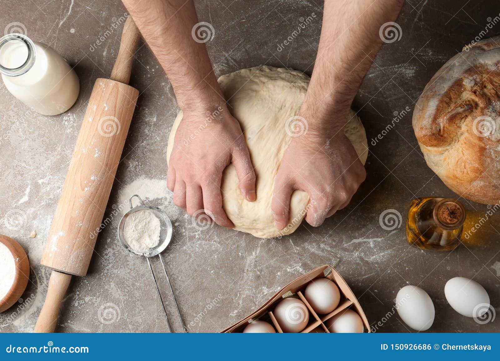 Male Baker Preparing Bread Dough at Kitchen Table Stock Photo - Image ...