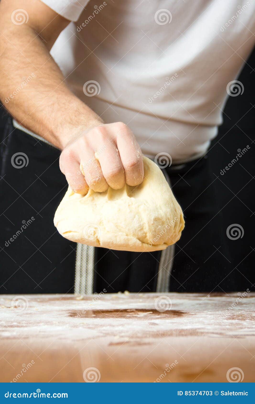Male Baker Punching Dough from the Table Stock Image - Image of ...