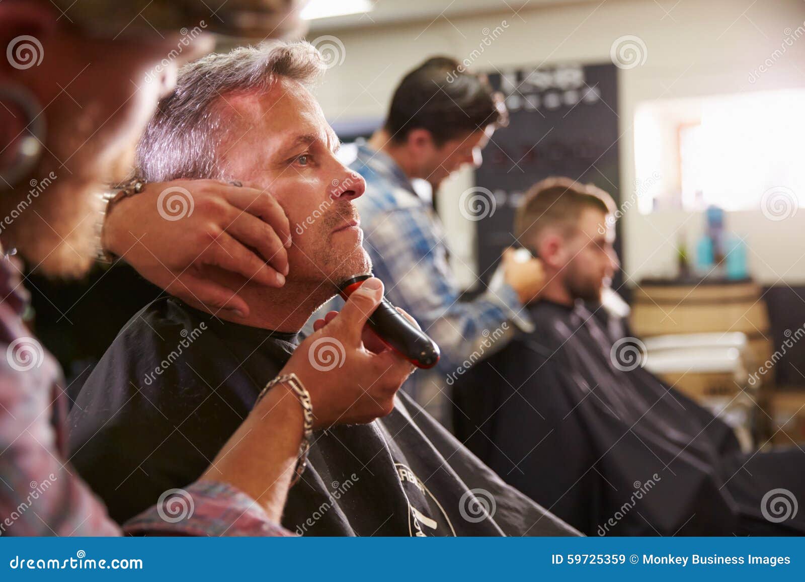 Male Barber Giving Client Shave in Shop Stock Image - Image of hipster ...