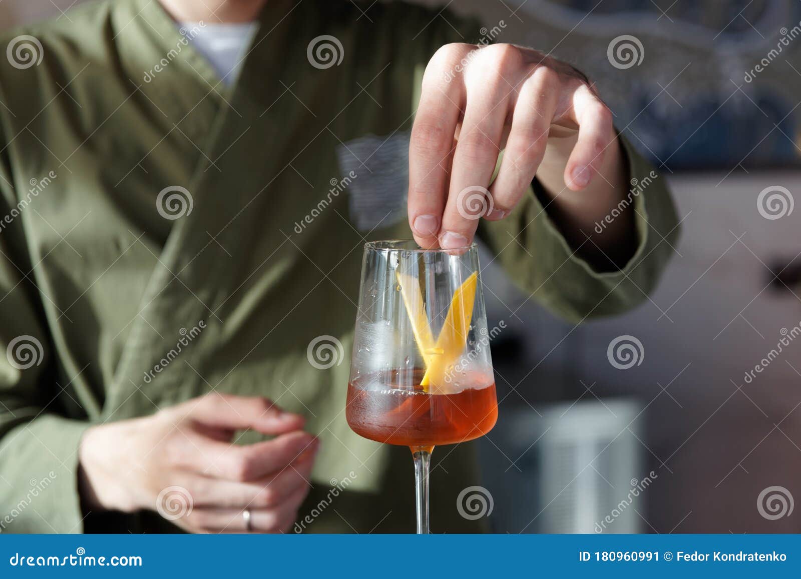 Male Bartender is Adding Lemon Zest To Cocktail Stock Image - Image of ...