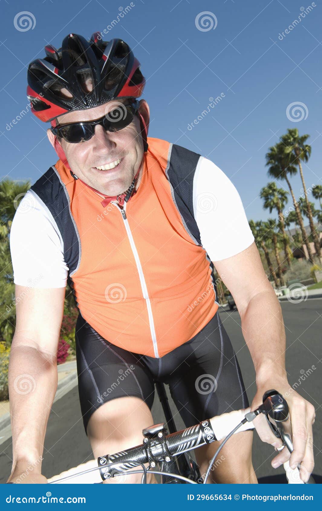 Male Bicyclist Riding Bicycle Stock Photo - Image of fitness, safety ...