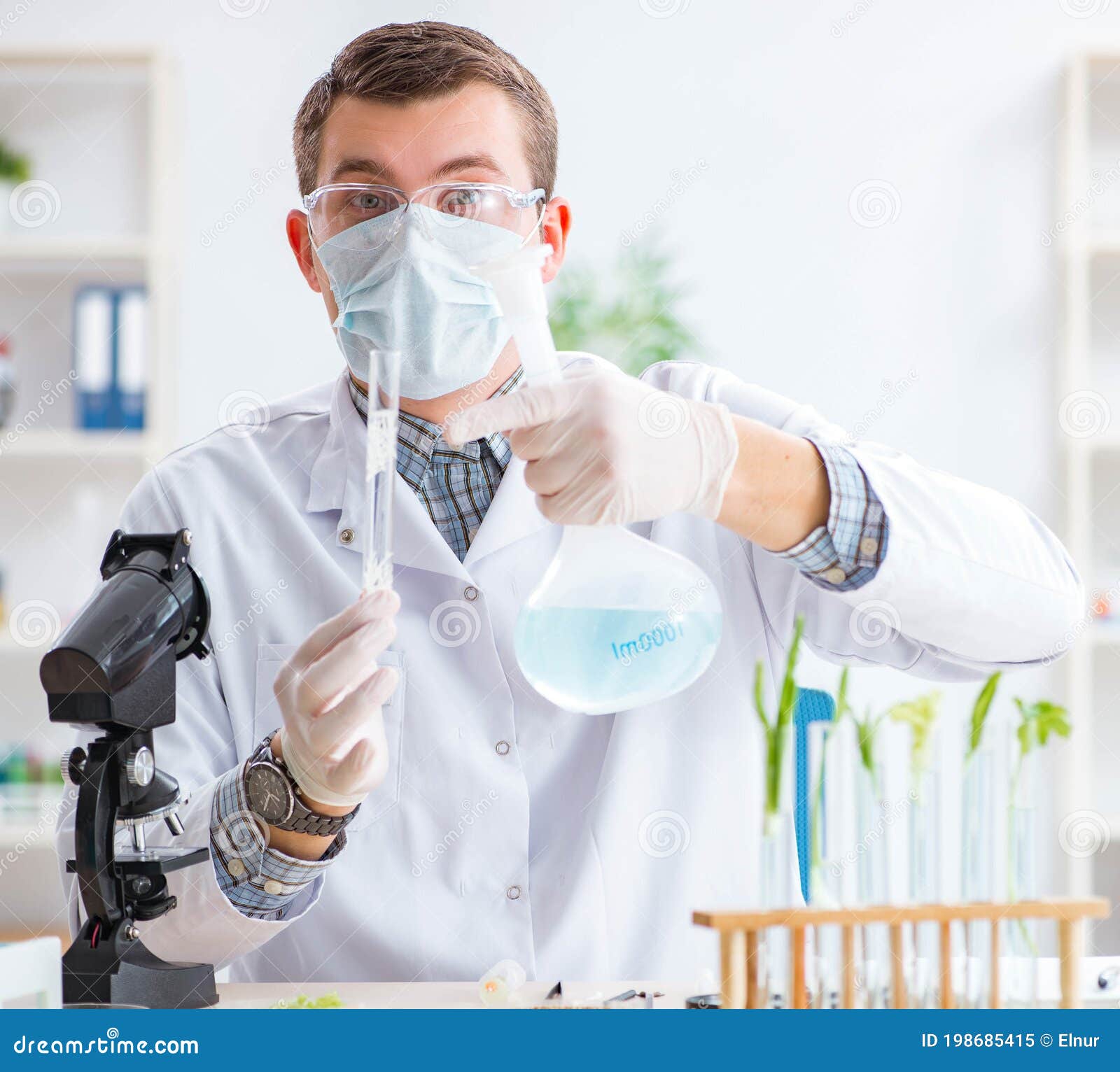 Male Biochemist Working in the Lab on Plants Stock Image - Image of ...