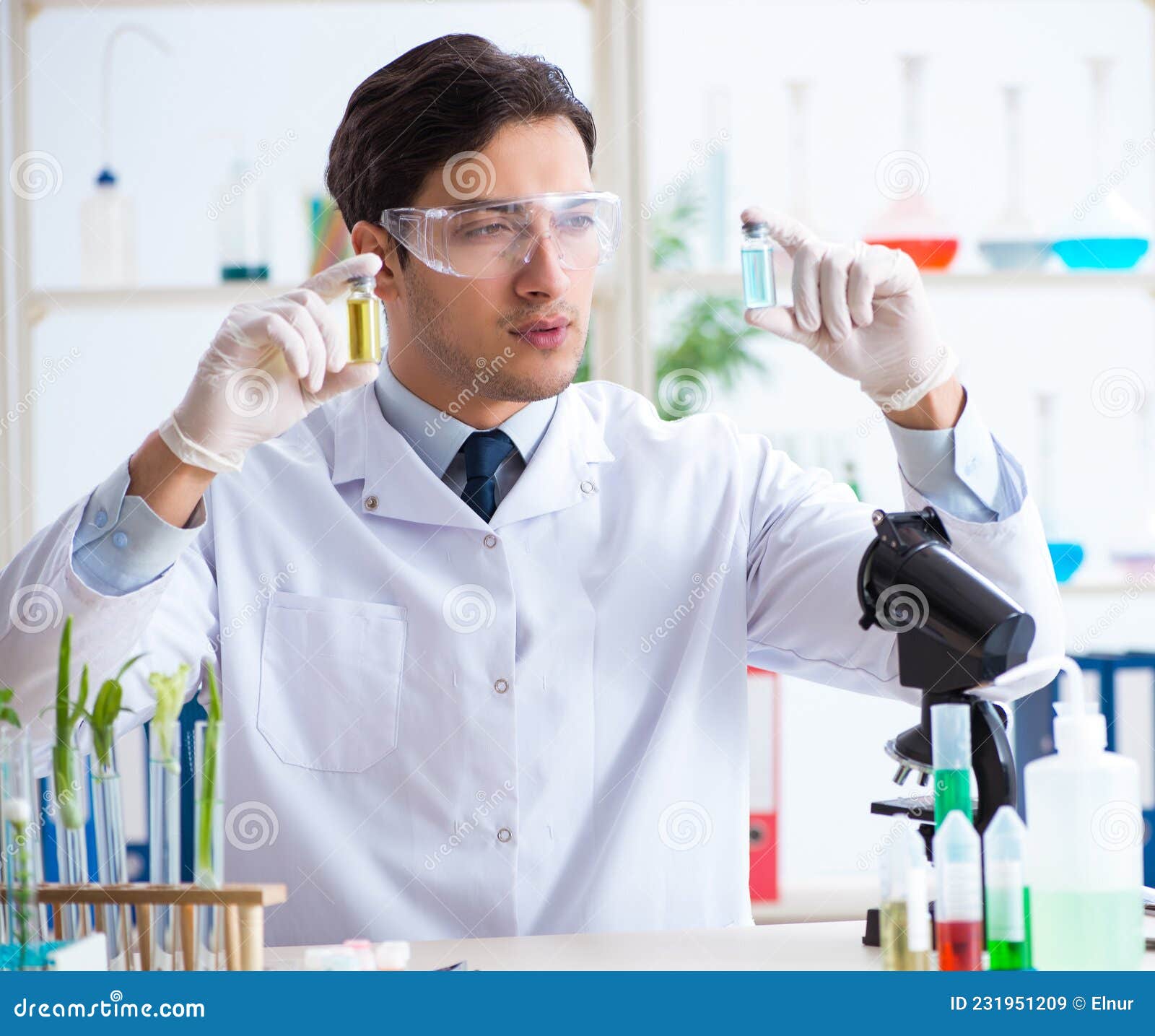 Male Biochemist Working in the Lab on Plants Stock Image - Image of ...