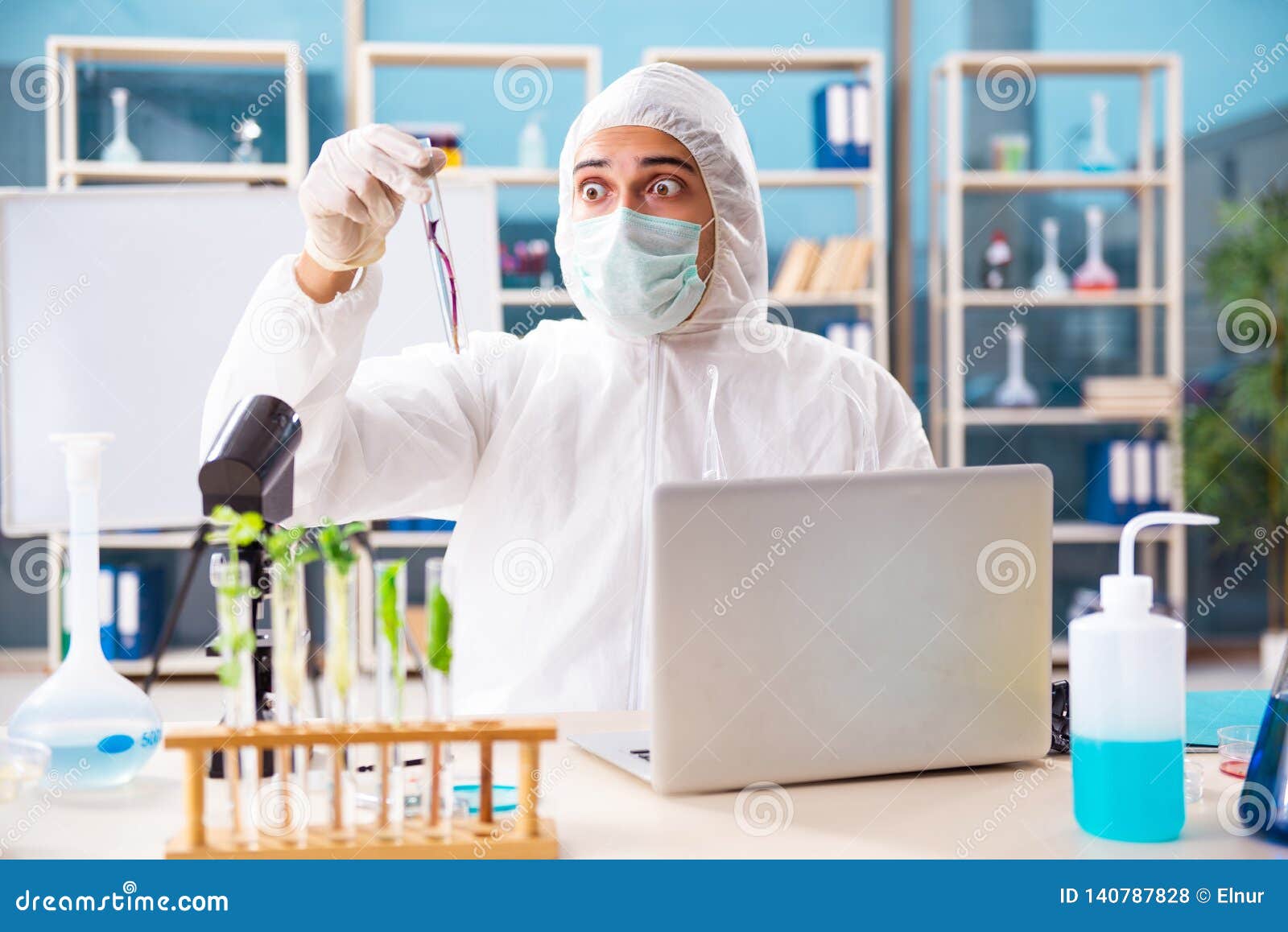 The Male Biotechnology Scientist Chemist Working in the Lab Stock Photo ...