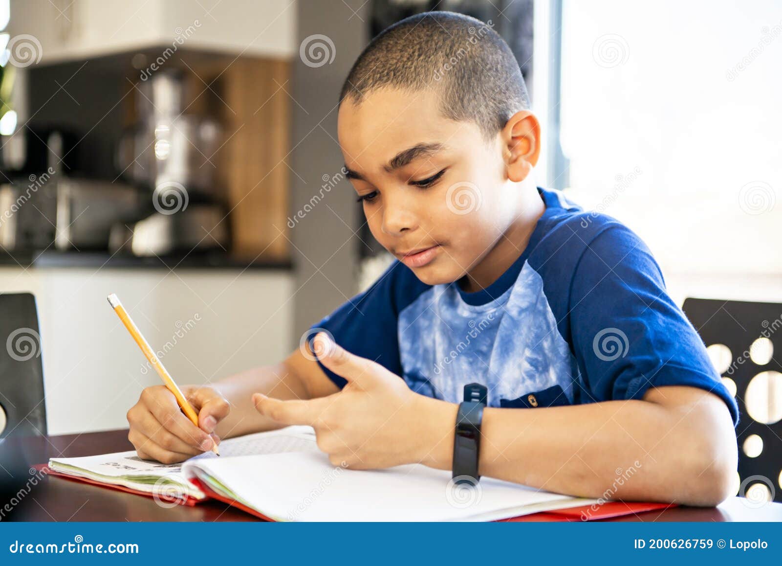 A Male Black Child Doing Homework at Home Stock Image - Image of ...