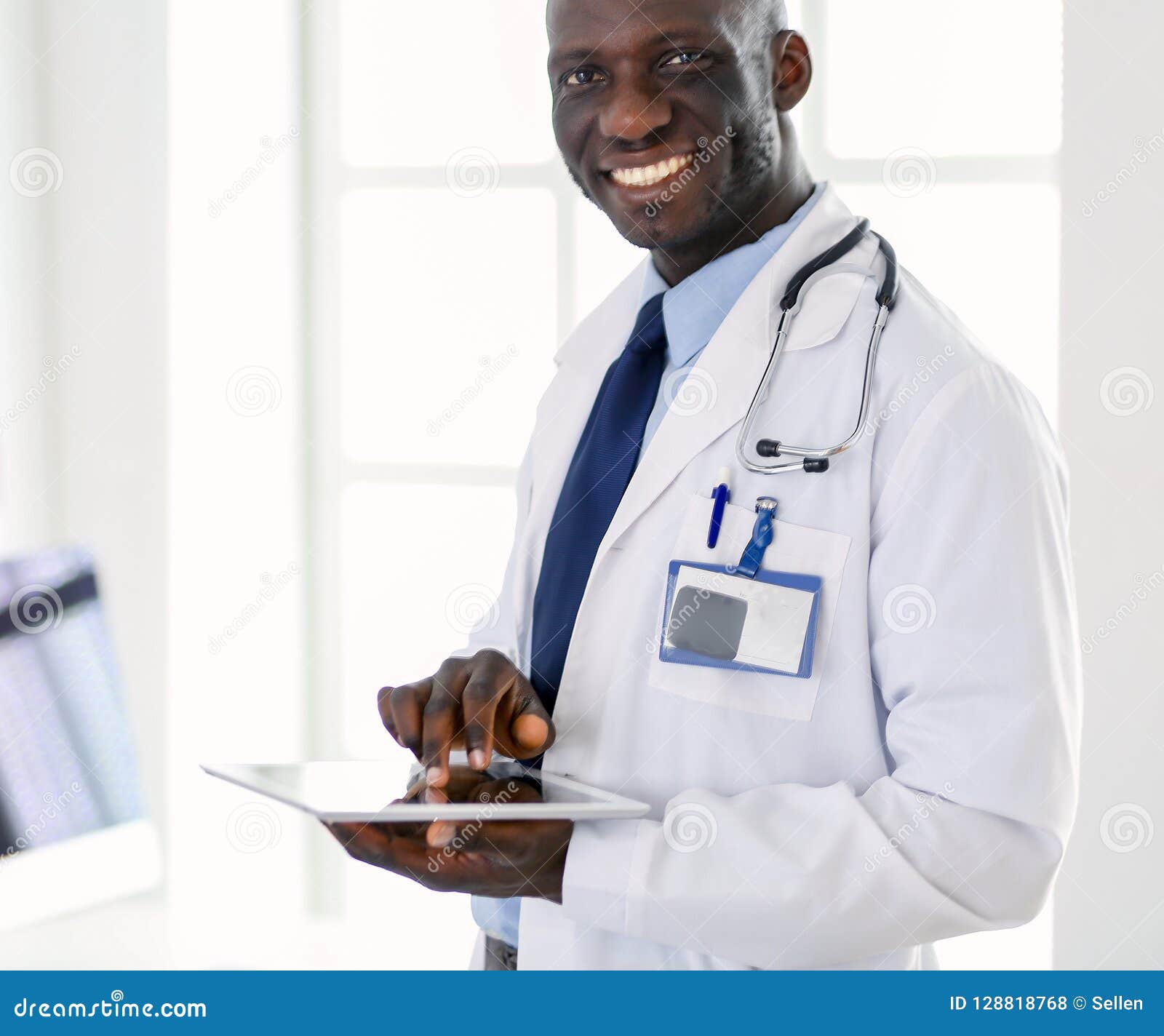 Male Black Doctor Worker with Tablet Computer Standing in Hospital ...