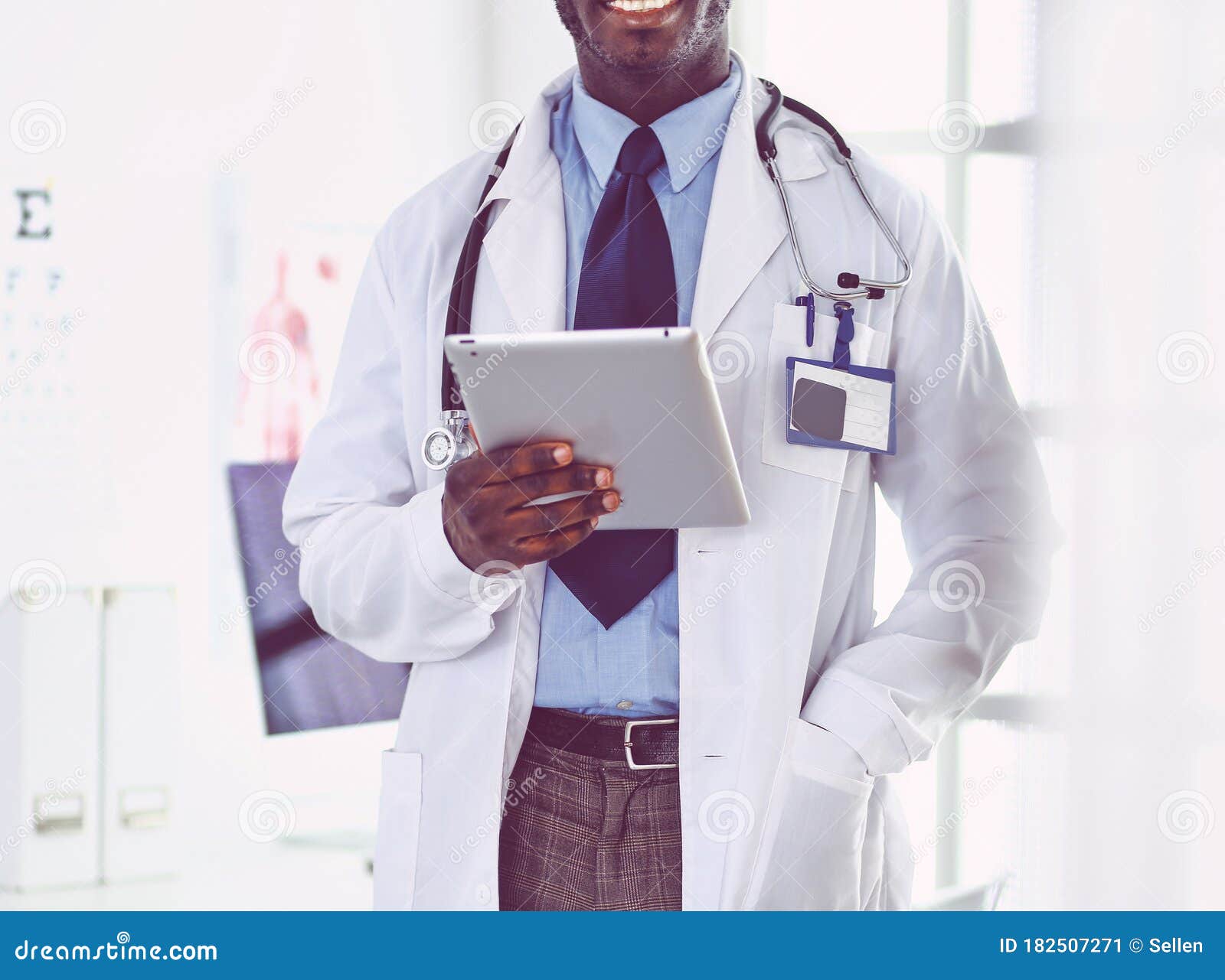 Male Black Doctor Worker with Tablet Computer Standing in Hospital ...
