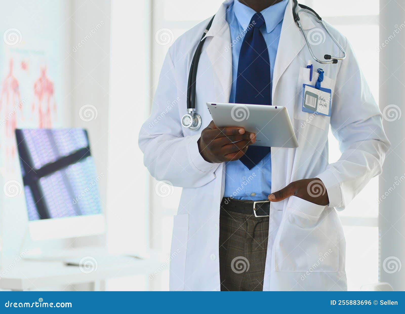 Male Black Doctor Worker with Tablet Computer Standing in Hospital ...