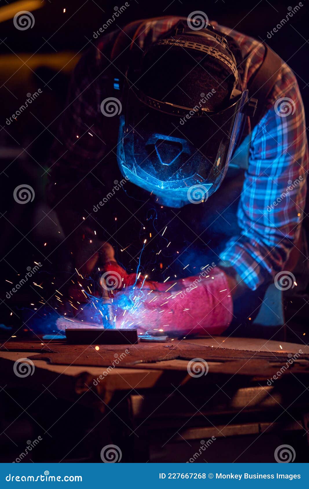 Male Blacksmith Wearing Protective Safety Visor Arc Welding Metalwork ...