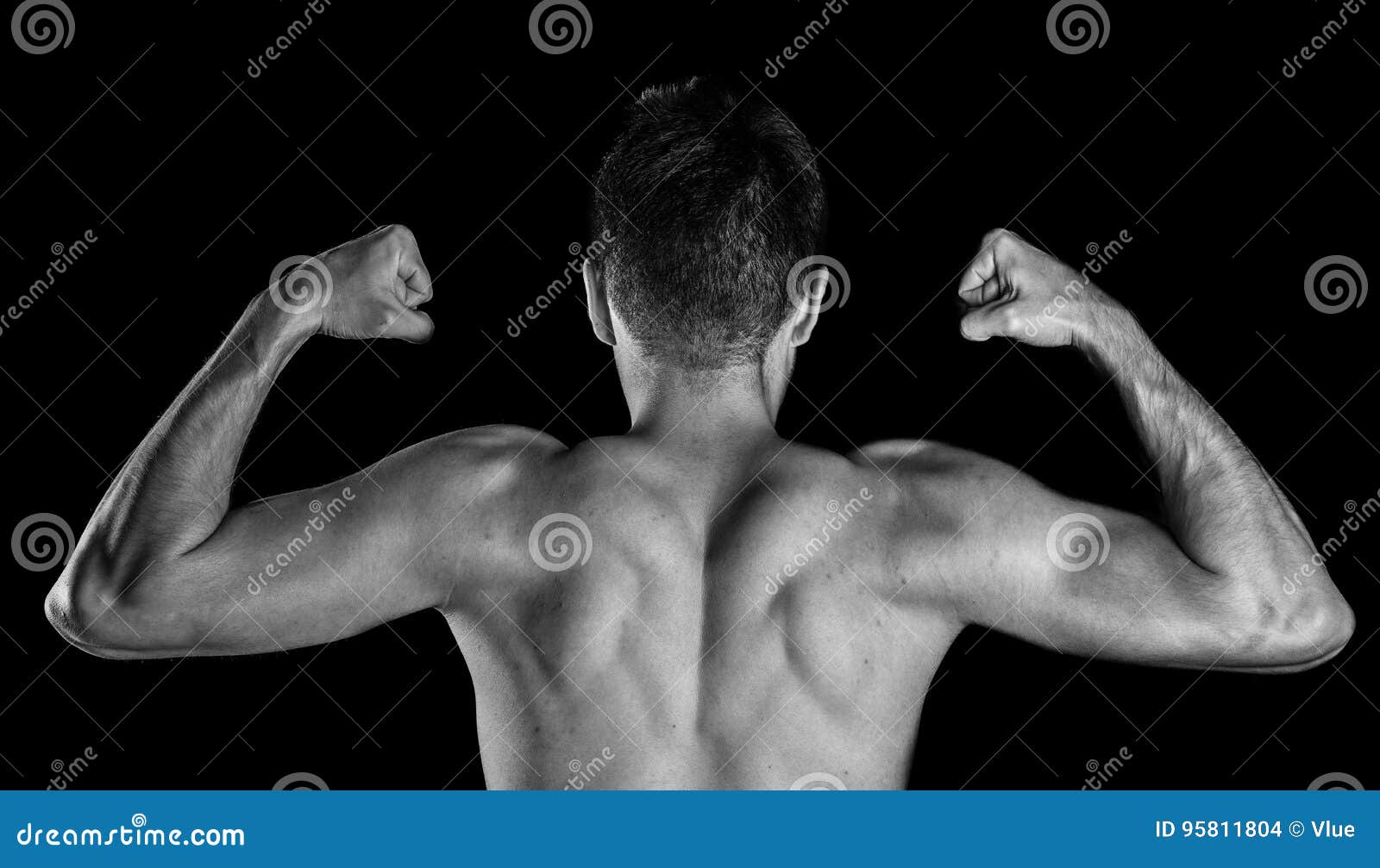 Male Bodybuilder Flexing His Biceps, Back View Stock Photo - Image of ...