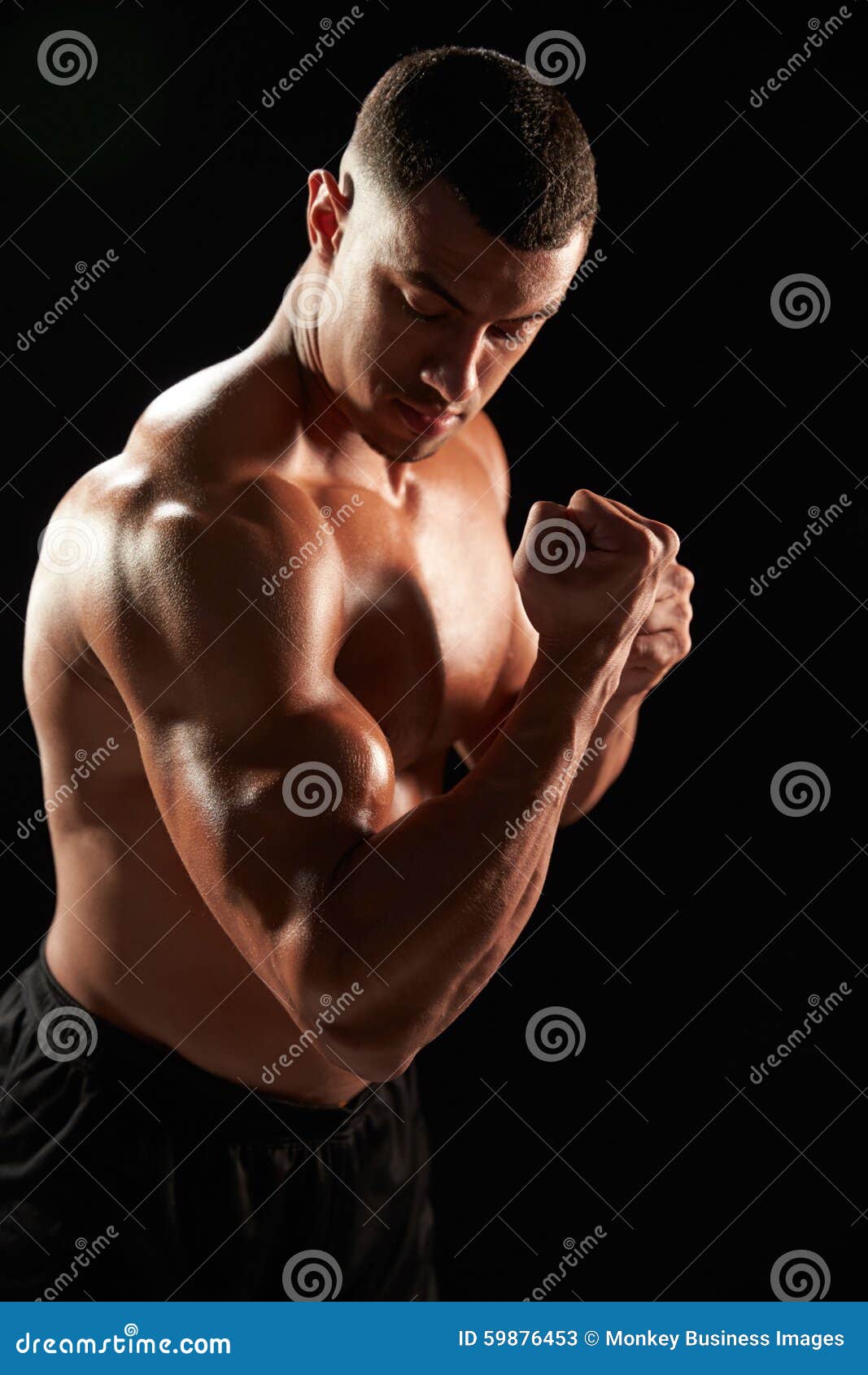 Male Bodybuilder Flexing Muscles Stock Image - Image of biceps ...