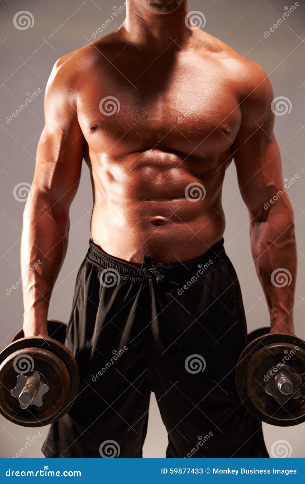 Male Bodybuilder Holding Heavy Dumbbells Stock Image - Image of muscle ...