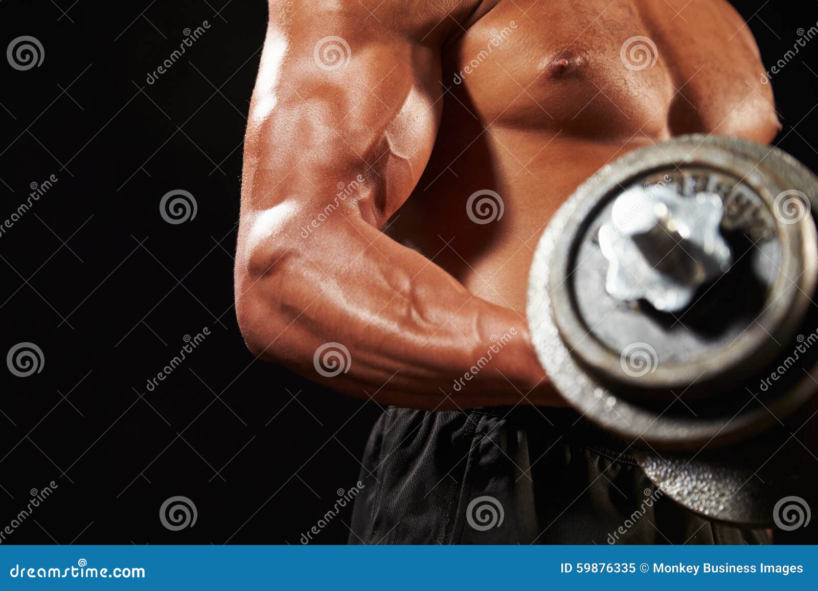 Male Bodybuilder Working Out with Heavy Dumbbell, Crop Stock Image ...