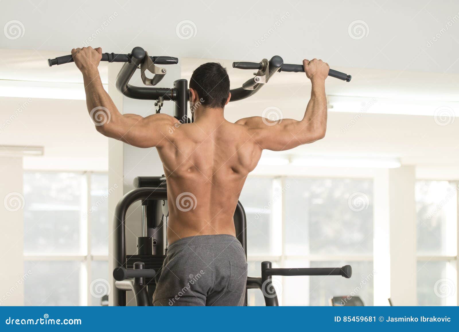 Male Bodybuilding Athlete Doing Pull Ups Stock Image - Image of eating ...