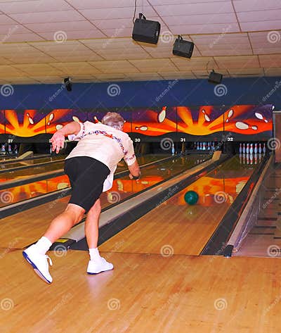Male bowler in action stock image. Image of pins, action - 1654459
