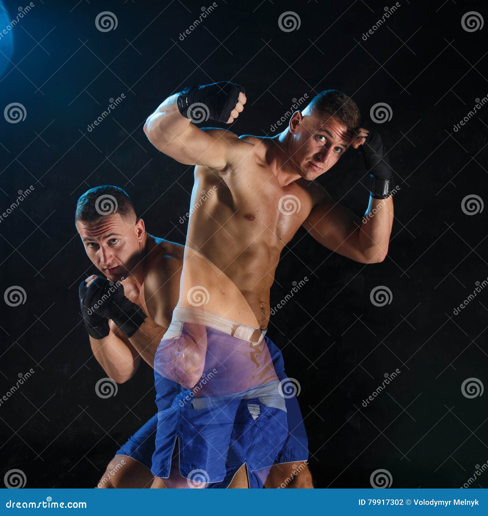 Male Boxer Boxing in a Dark Studio Stock Photo - Image of impact ...