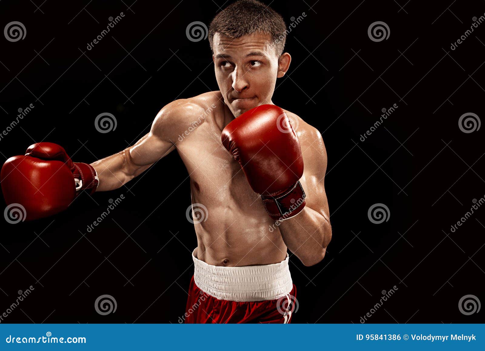 Male Boxer Boxing with Dramatic Edgy Lighting in a Dark Studio Stock ...