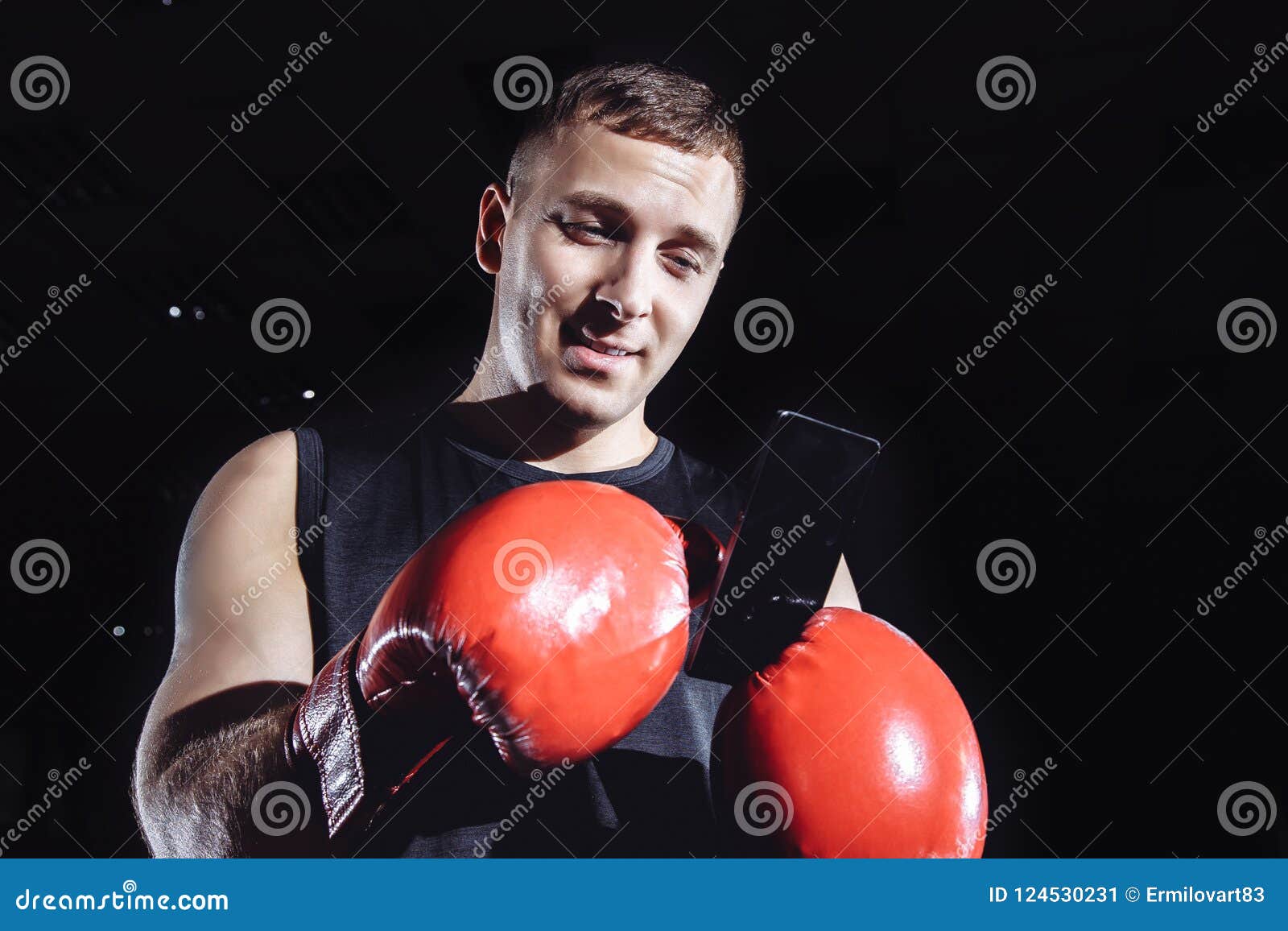 Male Boxer Using a Phone after a Workout Stock Image - Image of ...